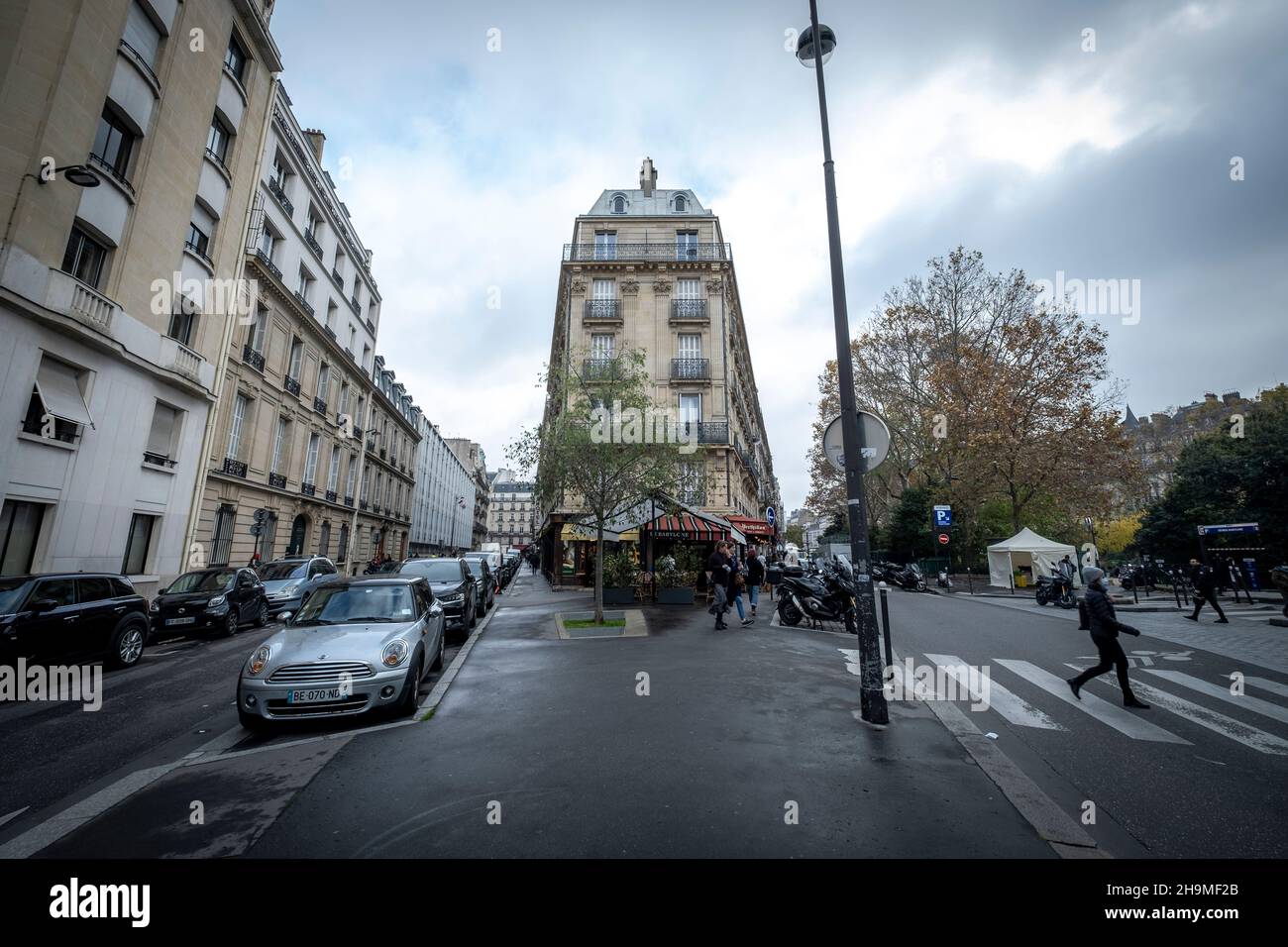 Street scene at the streets fo Paris and people walking around. Paris ...
