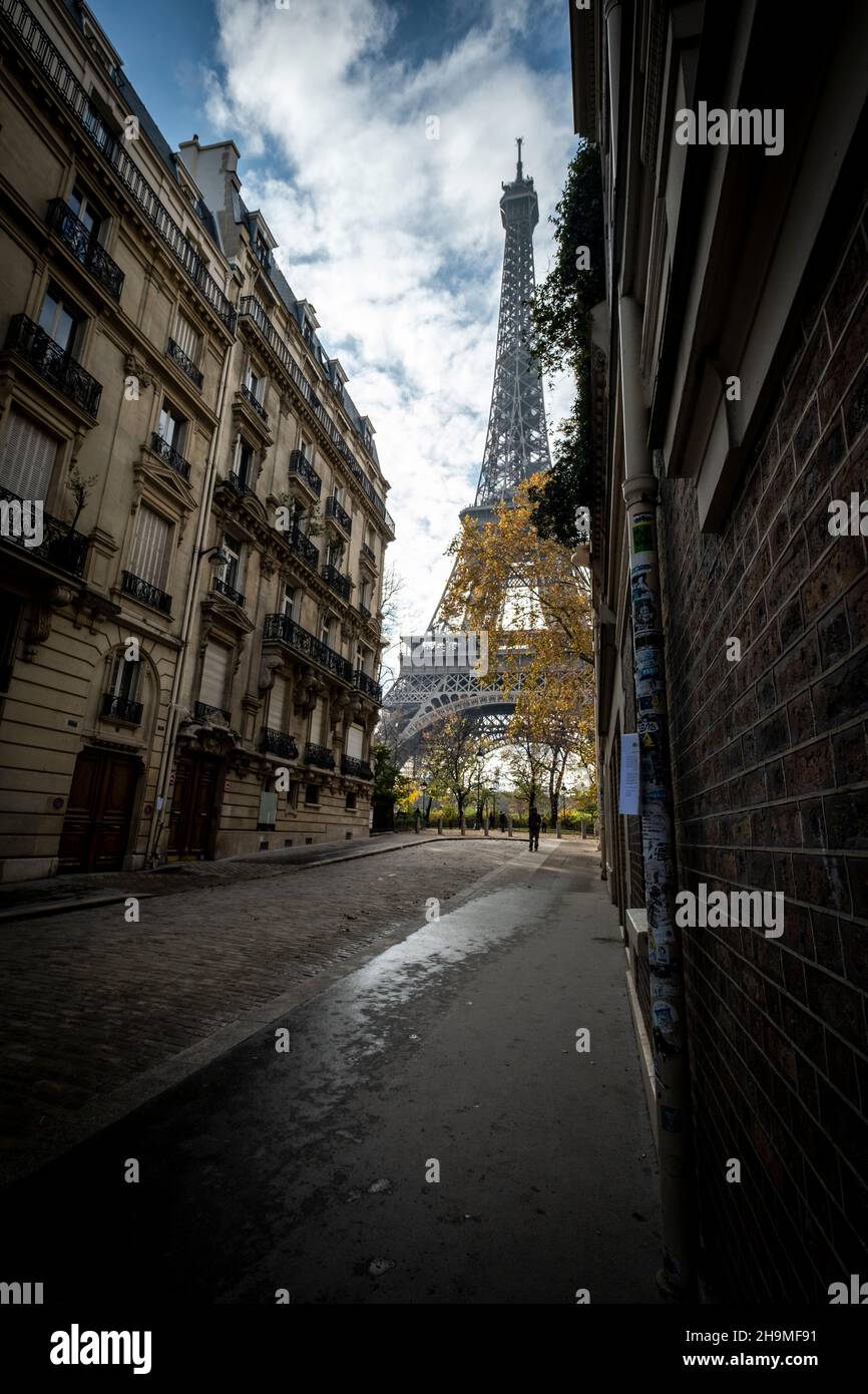 A back alley in Paris showcasing the architecture of the buildings with ...