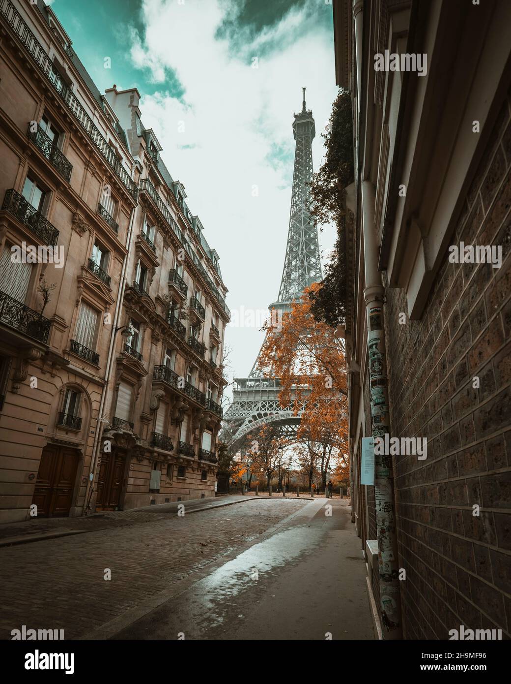 A back alley in Paris showcasing the architecture of the buildings with ...