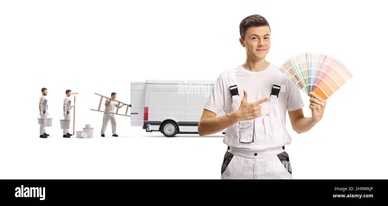 House decorators with a van and a young male worker pointing at a color ...