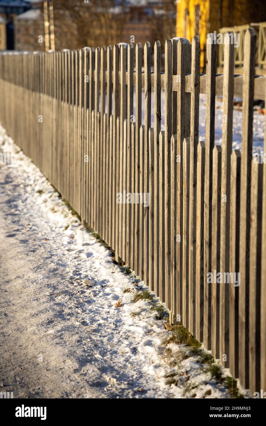 Snowy walking path at Stockholm bay on sunny freezing winter day with ...