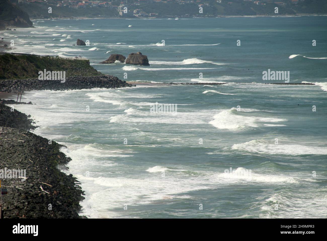 Aerial view of a beautiful blue sea shore with waves Stock Photo - Alamy