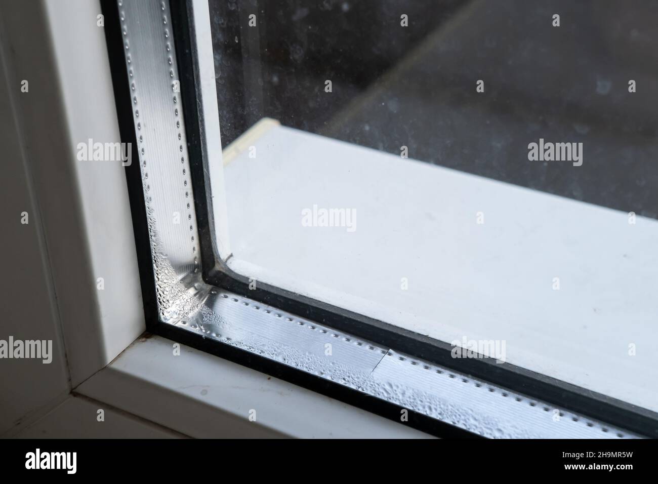 Condensation on the glass in the PVC window. Problematic, faulty ...