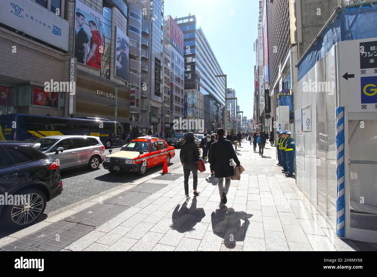 Chuo-dori Ave in the heart of Ginza, Tokyo with tall buildings, luxury ...