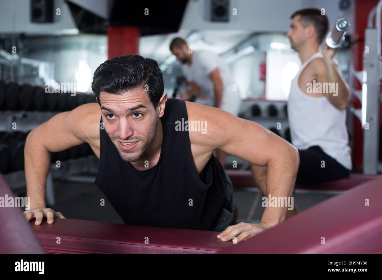 Man performing push-ups during training Stock Photo - Alamy