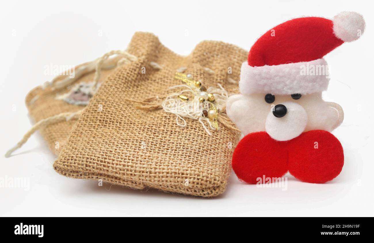 Santa Claus with gift sac over white background Stock Photo - Alamy