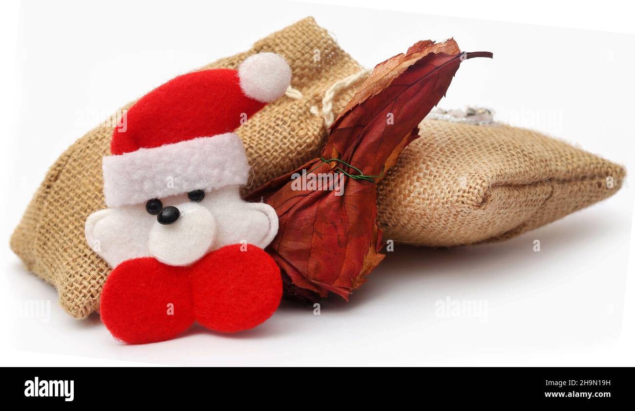 Santa Claus with gift sac over white background Stock Photo - Alamy
