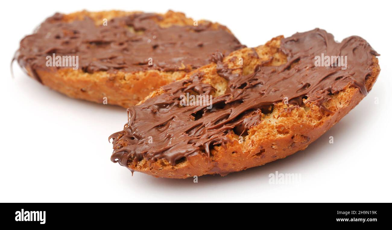 Toast biscuit with chocolate cream over white background Stock Photo ...