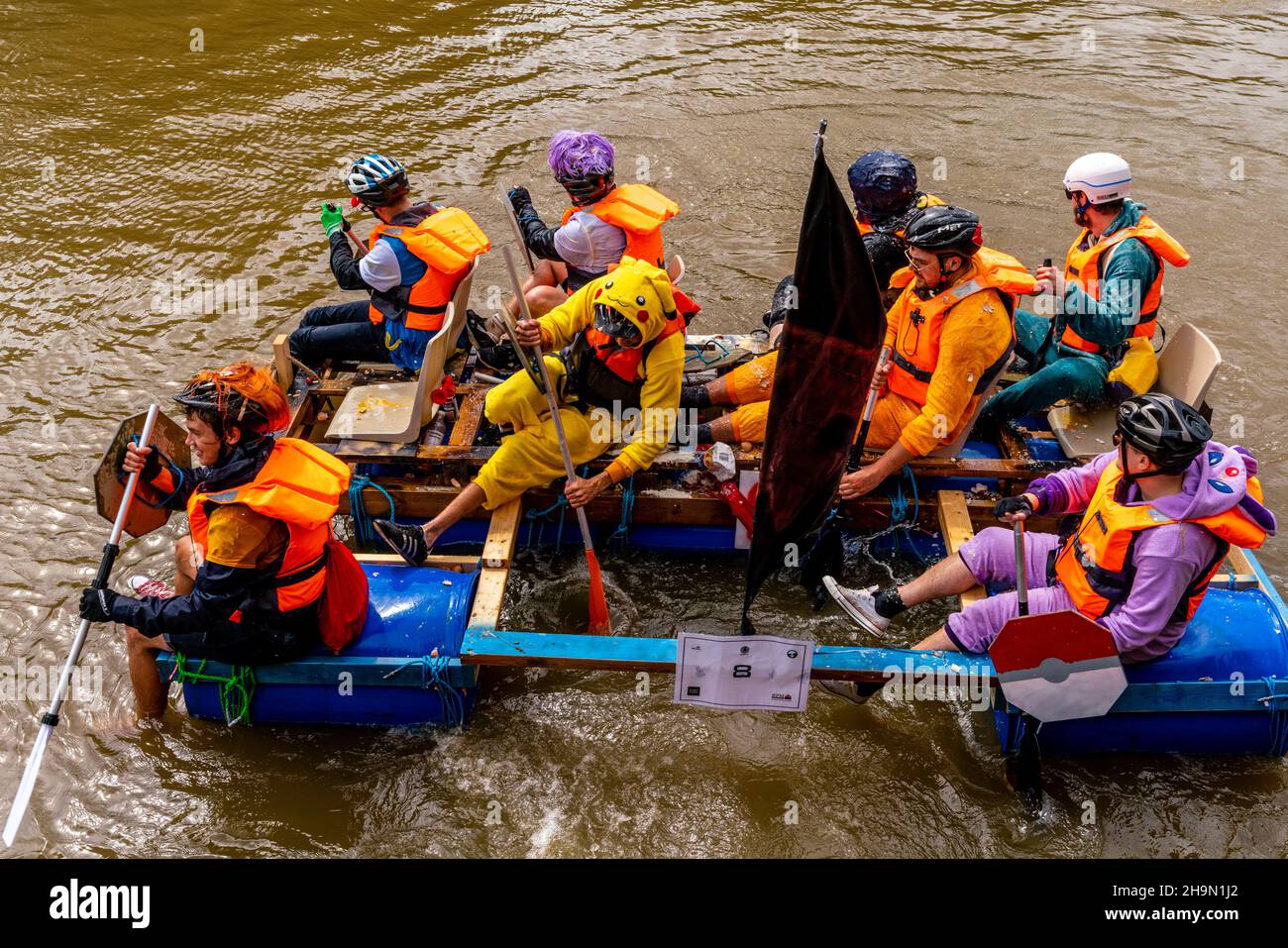 Local People In Home Made Rafts Float Down The River Ouse During The ...