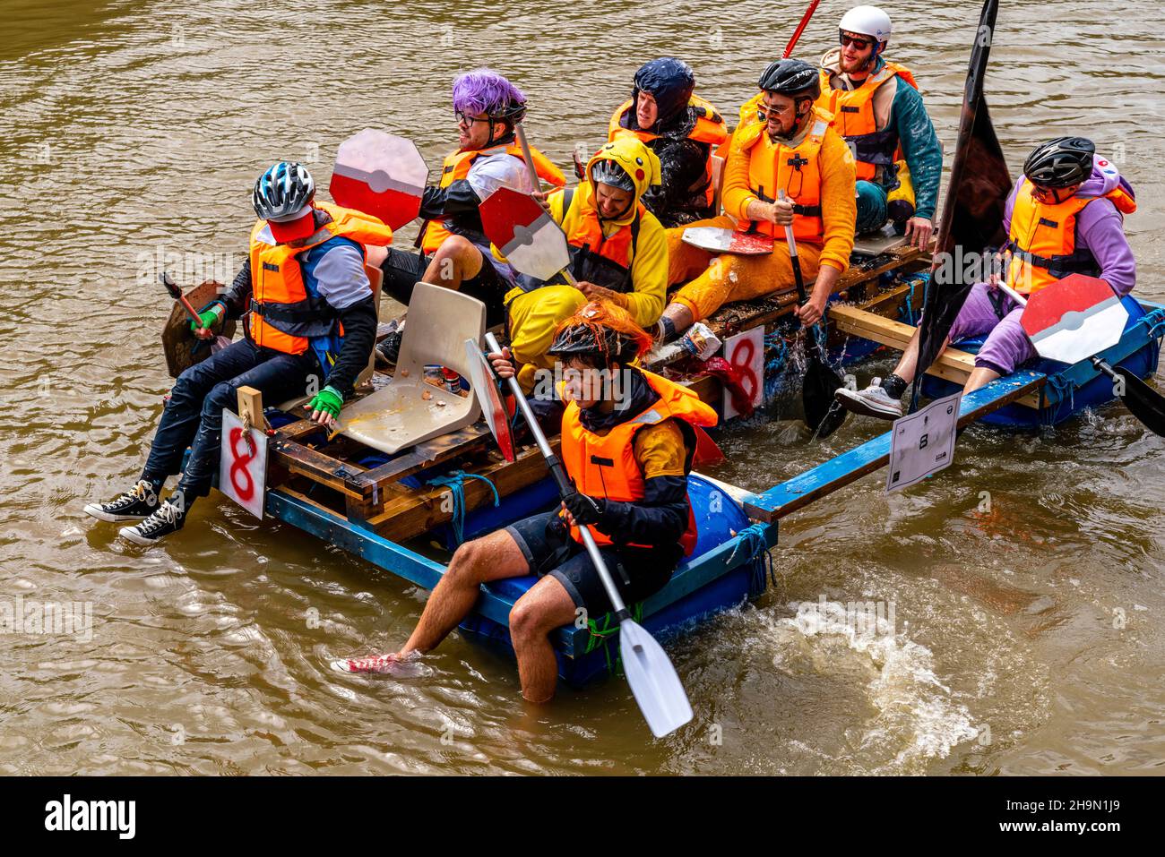 Local People In Home Made Rafts Float Down The River Ouse During The ...