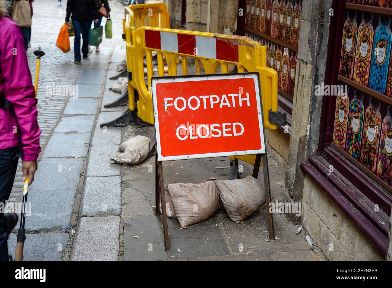 Footpath Closed red warning sign and barrier on footpath in Canterbury ...