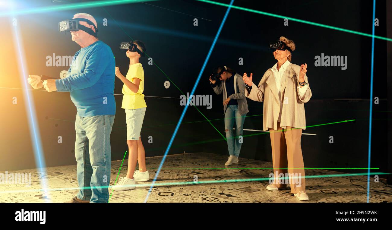 Family playing VR games together Stock Photo - Alamy
