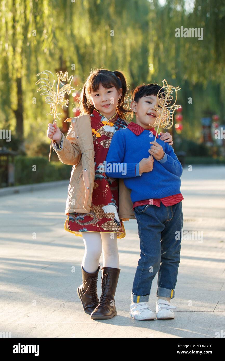 Happy children eat sugar painting Stock Photo - Alamy