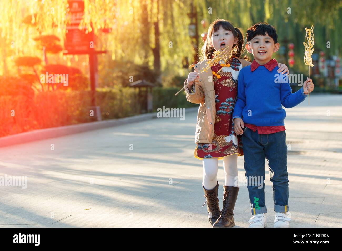 Happy children eat sugar painting Stock Photo - Alamy