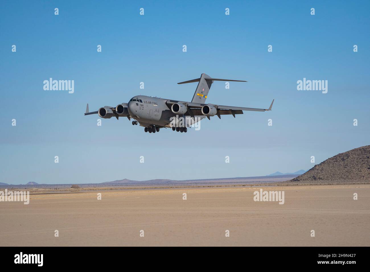 A C-17 Globemaster III from the 305th Air Mobility Wing, Joint Base ...