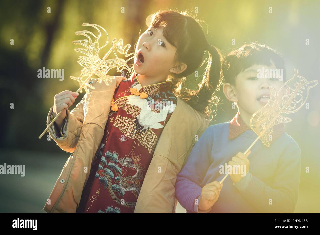 Happy children eat sugar painting Stock Photo - Alamy