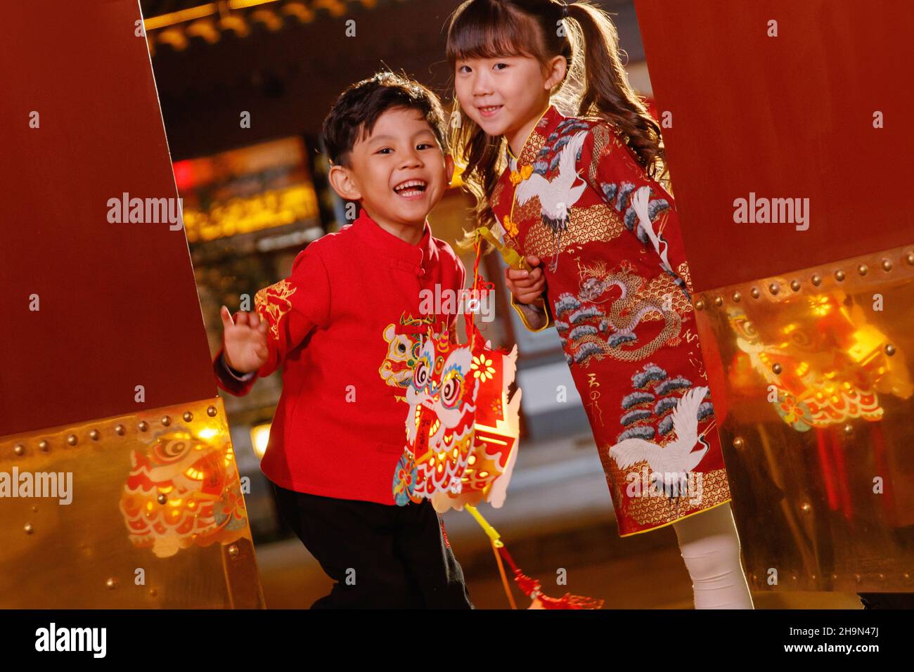Happy boys and girls to celebrate the New Year Stock Photo - Alamy