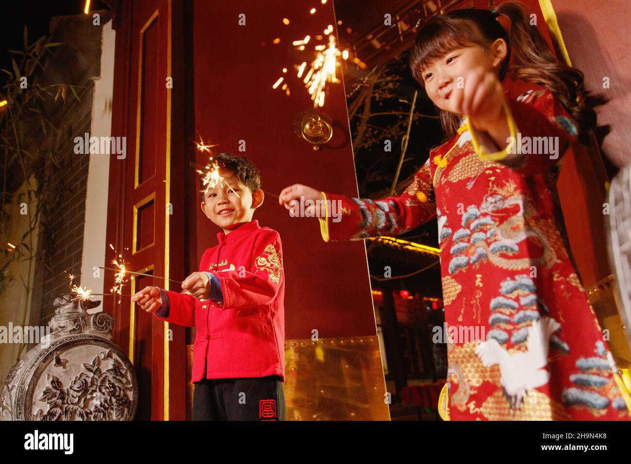 Happy children's fireworks Stock Photo - Alamy