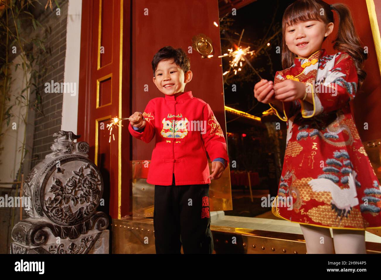 Happy children's fireworks Stock Photo - Alamy