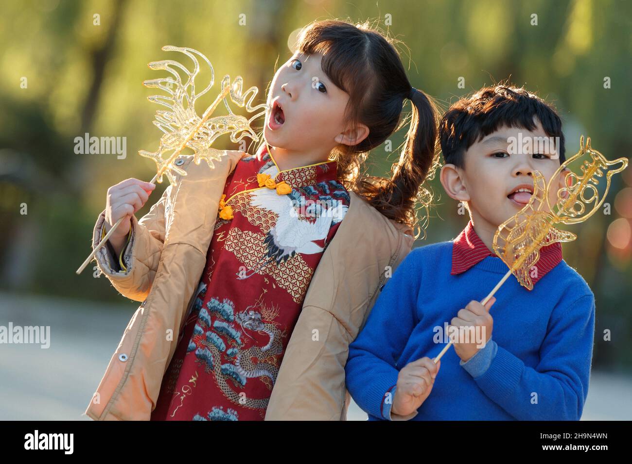 Happy children eat sugar painting Stock Photo - Alamy