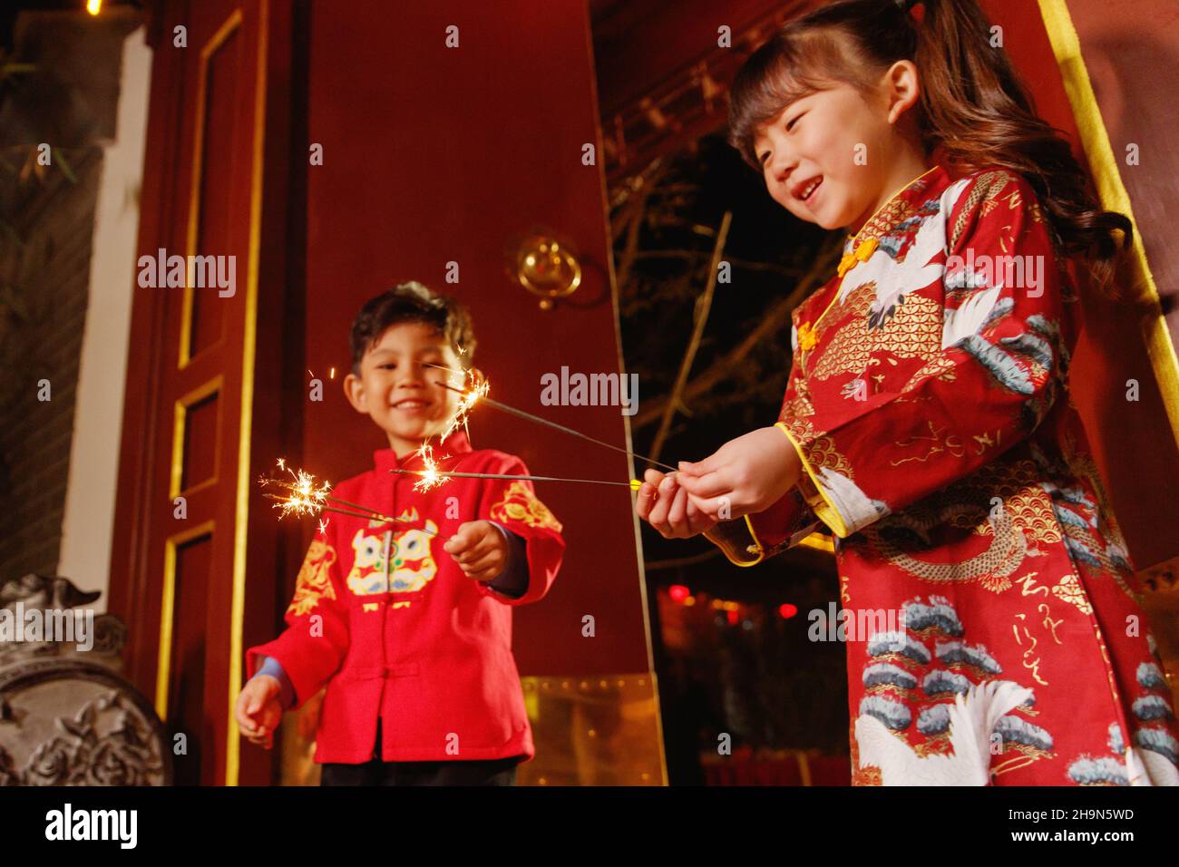 Happy children's fireworks Stock Photo - Alamy