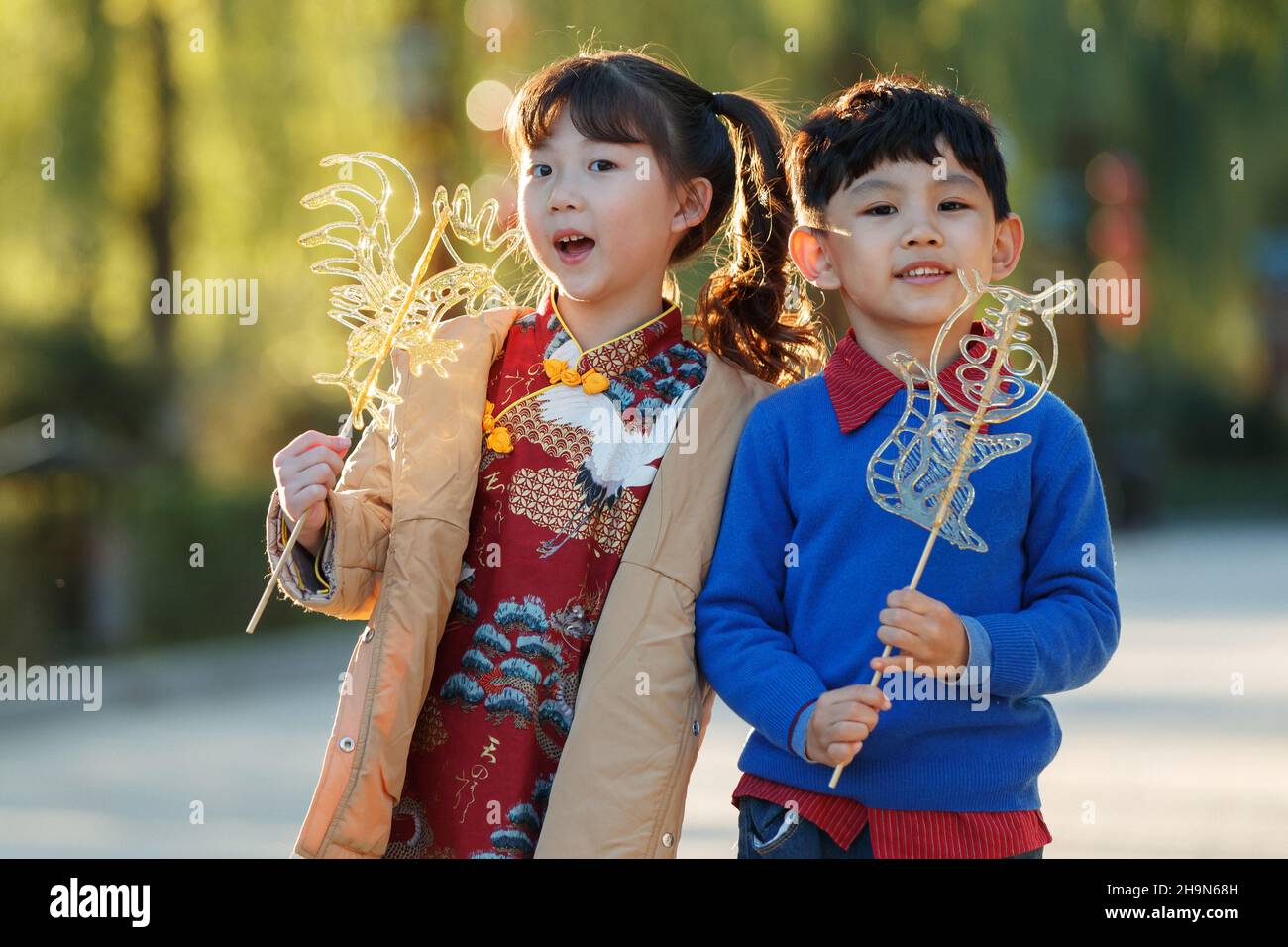 Happy children eat sugar painting Stock Photo - Alamy