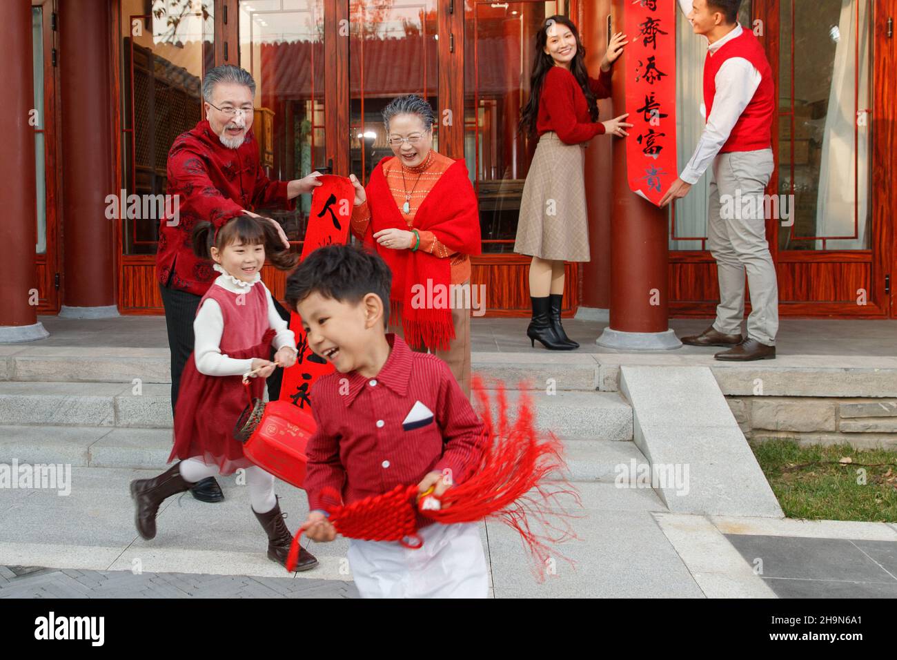 Happy children playing chase celebrates the New Year Stock Photo - Alamy