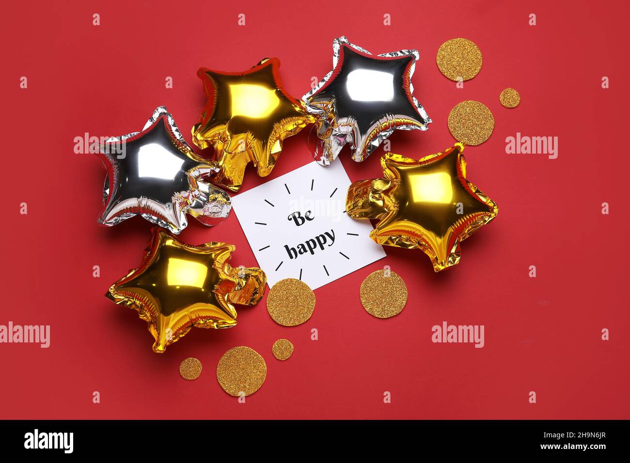 Beautiful different balloons and text BE HAPPY on red background Stock ...