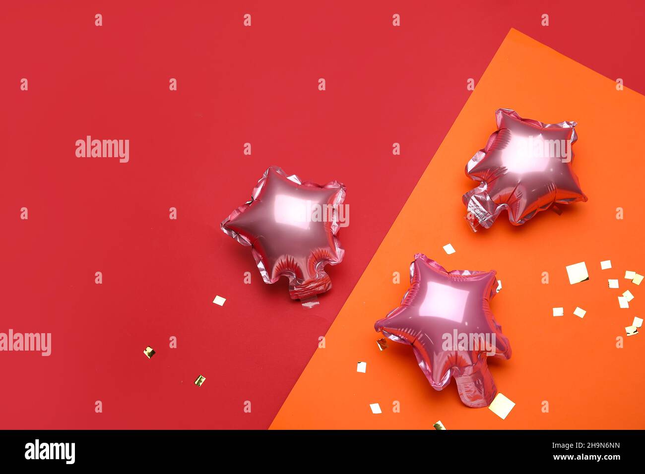 Beautiful pink balloons on color background Stock Photo - Alamy