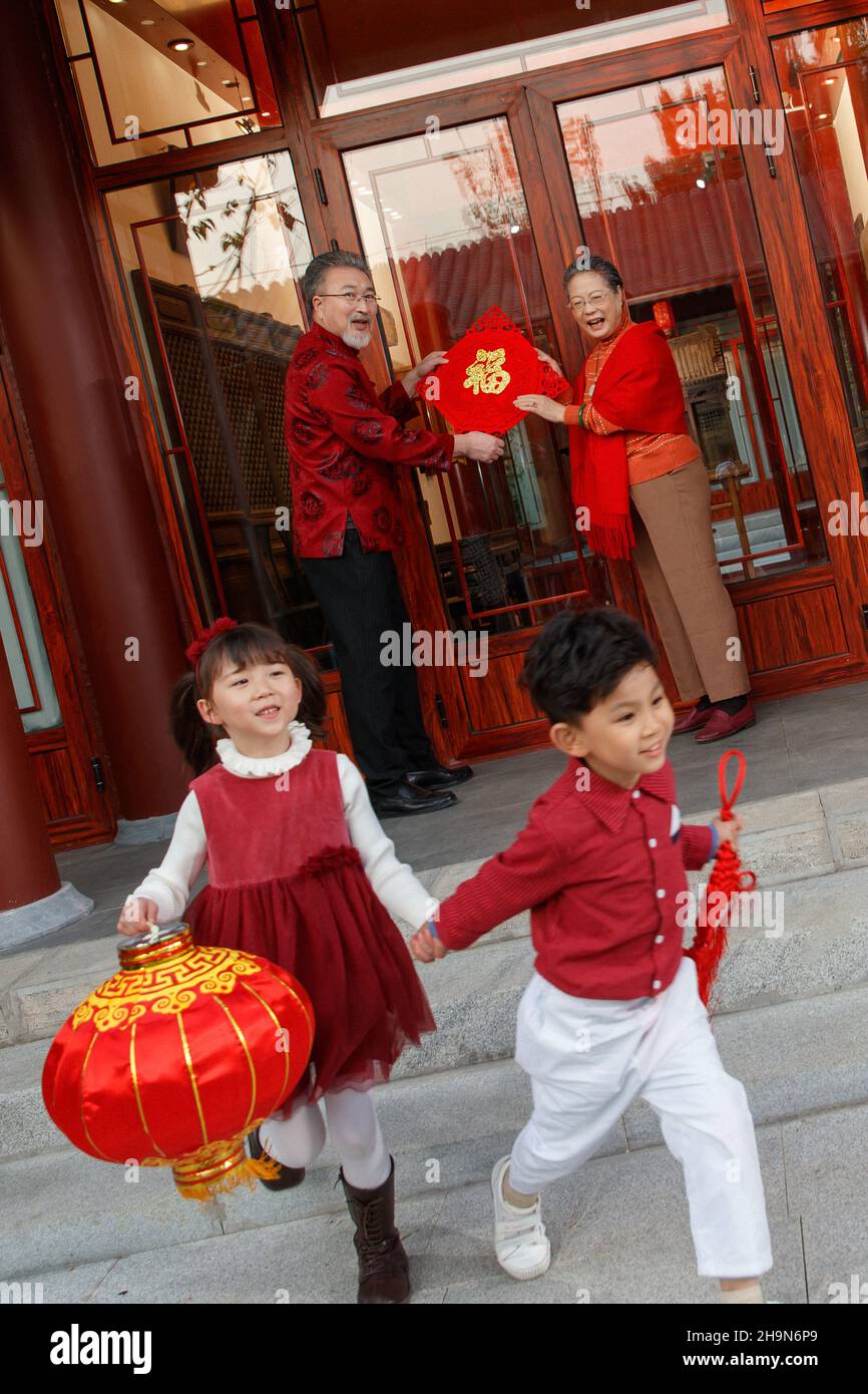 Happy children playing chase celebrates the New Year Stock Photo - Alamy