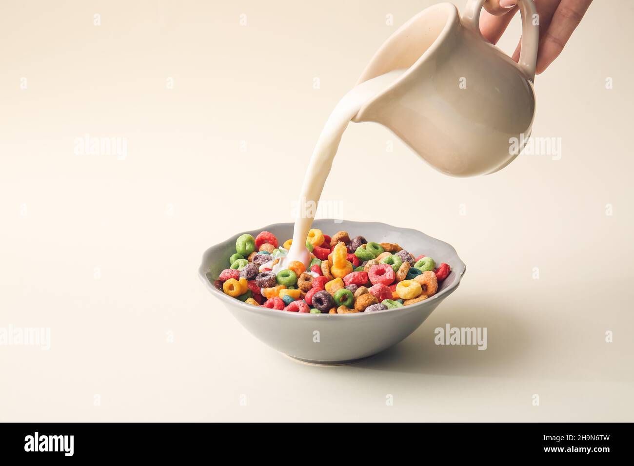 Pouring Milk Into Cereal