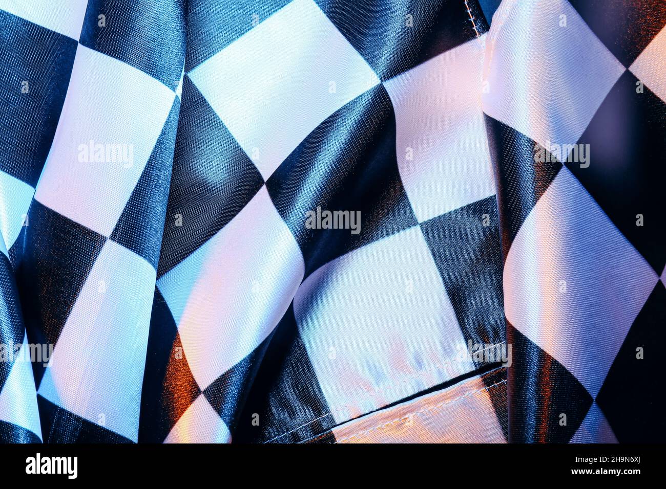 Racing flag as background, closeup view Stock Photo - Alamy