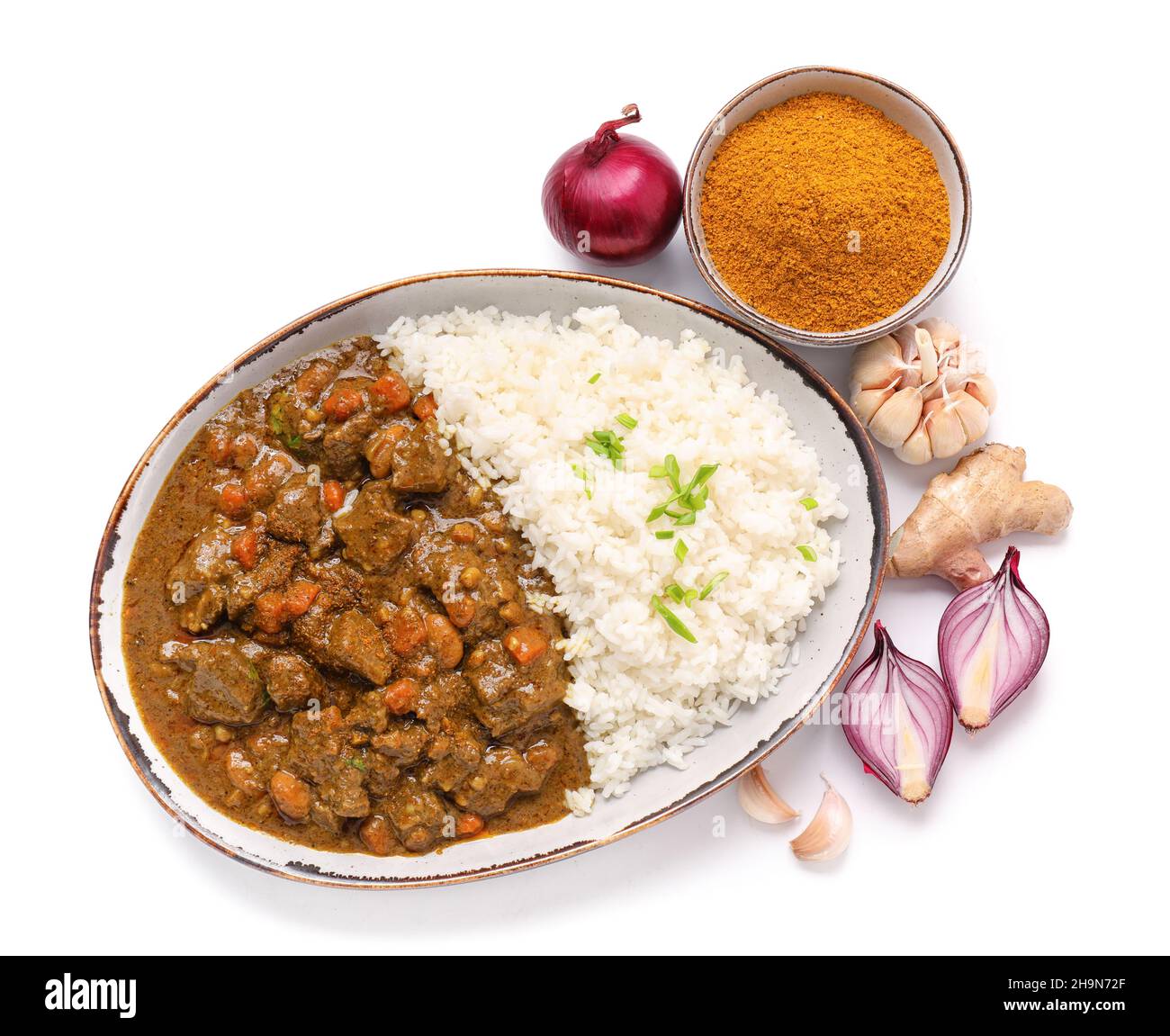 Plate with tasty beef curry and rice on white background Stock Photo ...