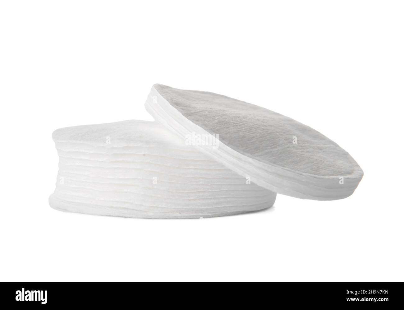 Clean cotton pads isolated on white Stock Photo - Alamy