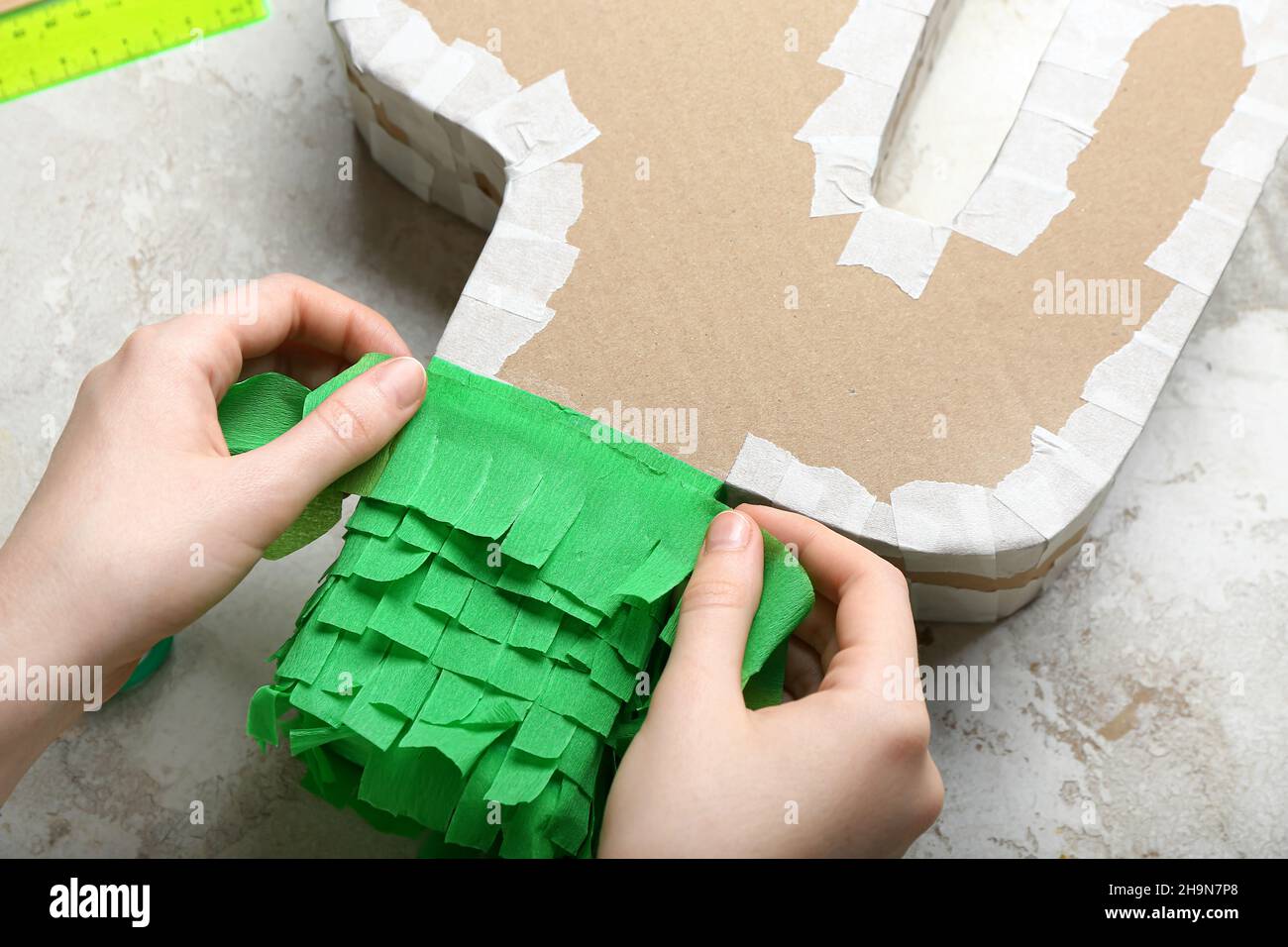 Woman making traditional Mexican pinata Stock Photo - Alamy