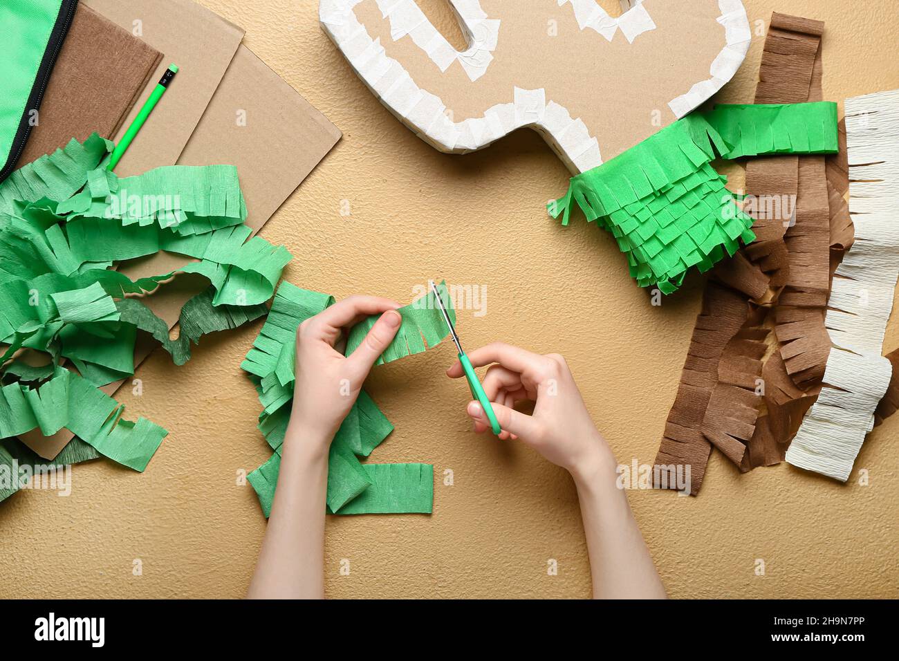 Kids hands with tissue paper hi-res stock photography and images - Alamy