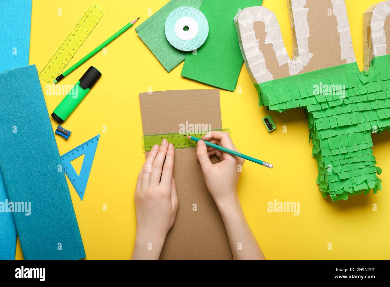 Woman making traditional Mexican pinata Stock Photo - Alamy