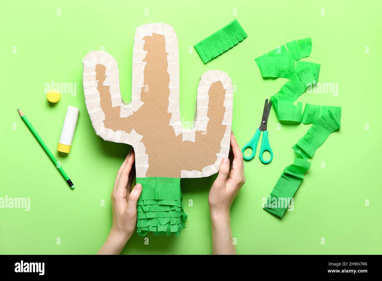 Woman making traditional Mexican pinata Stock Photo - Alamy