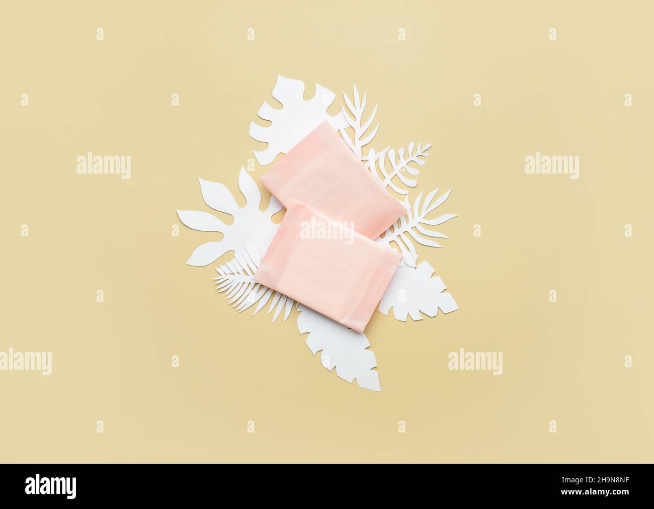 Menstrual pads on yellow background Stock Photo - Alamy