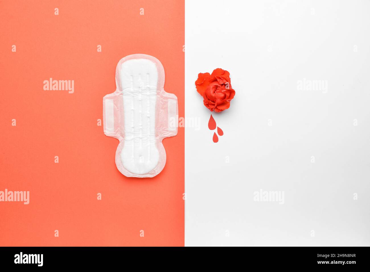 Paper blood drops, flower and menstrual pad on color background Stock ...