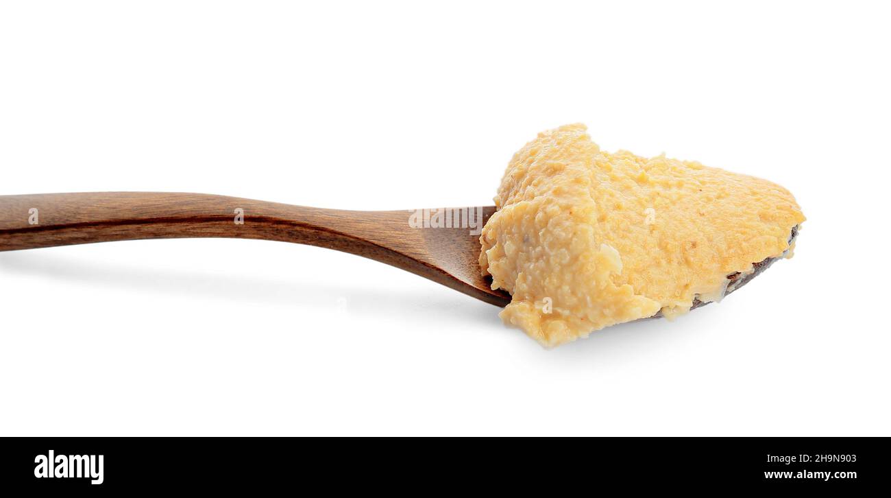 Spoon with delicious hummus on white background Stock Photo - Alamy