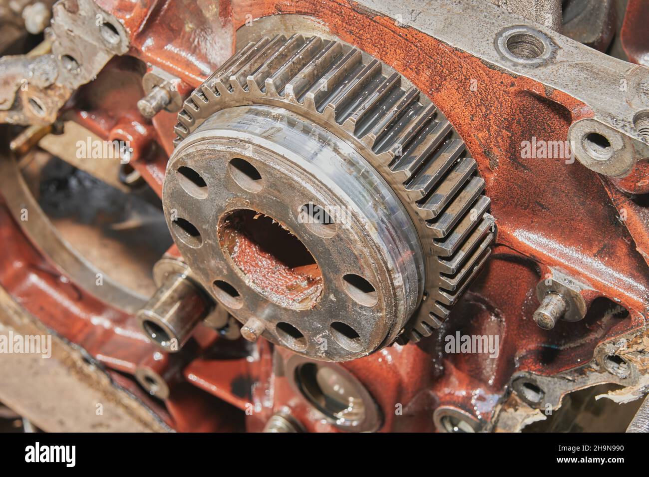 High Angle Zoom View of Crankshaft Gear in Front of Car Engine or Auto ...