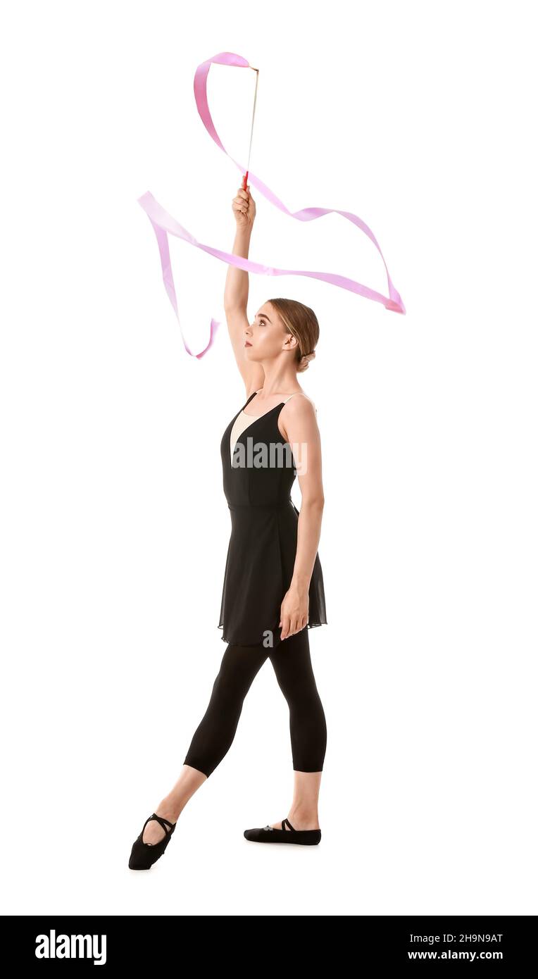 Beautiful young woman doing gymnastics with ribbon on white background ...