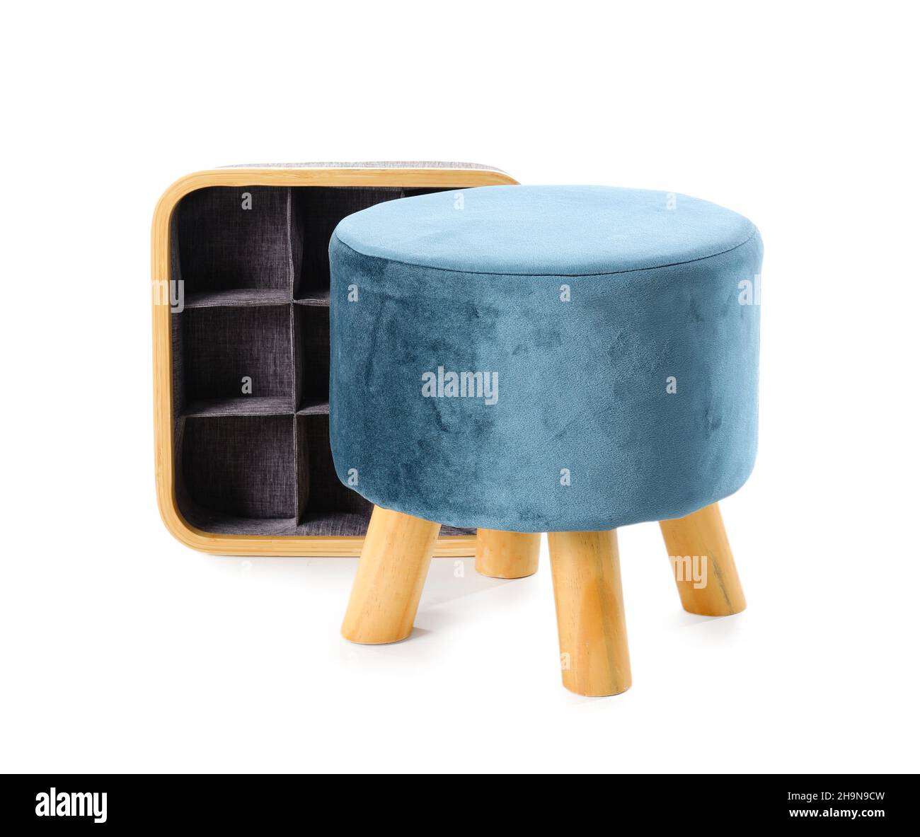 Blue pouf with organizer on white background Stock Photo - Alamy