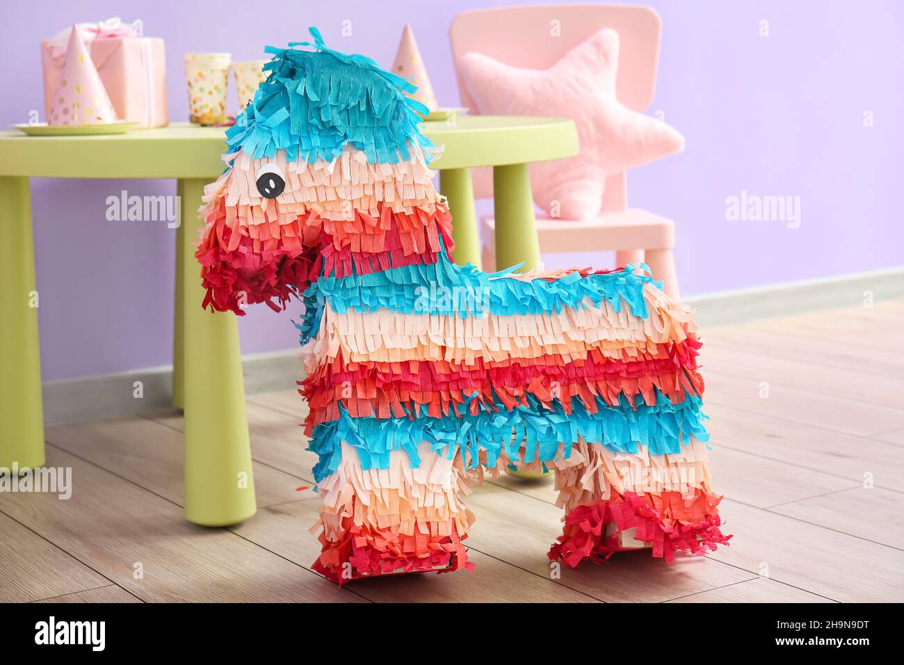 Mexican pinata in shape of horse in children's room Stock Photo - Alamy
