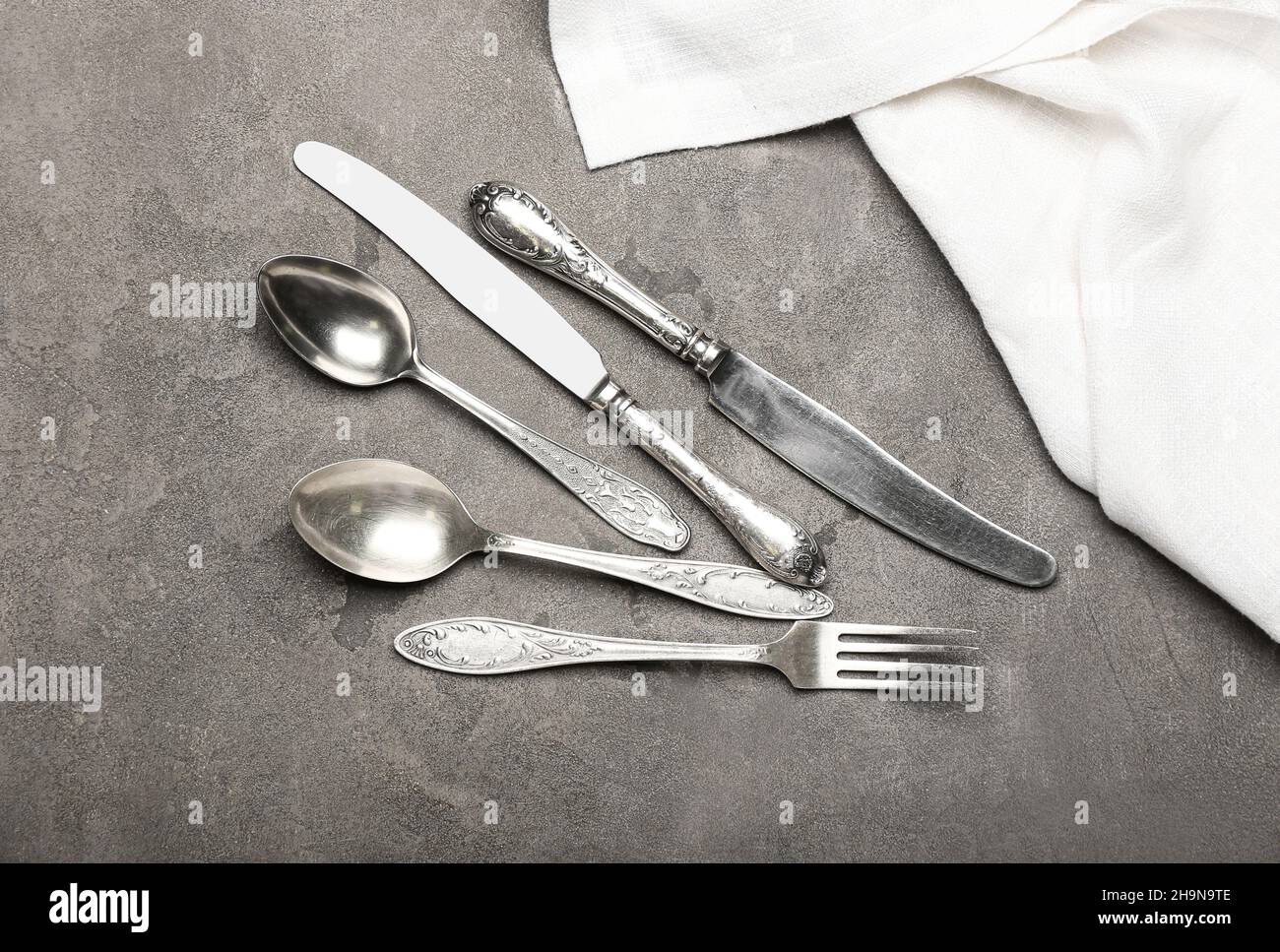 Silver cutlery on dark hi-res stock photography and images - Alamy
