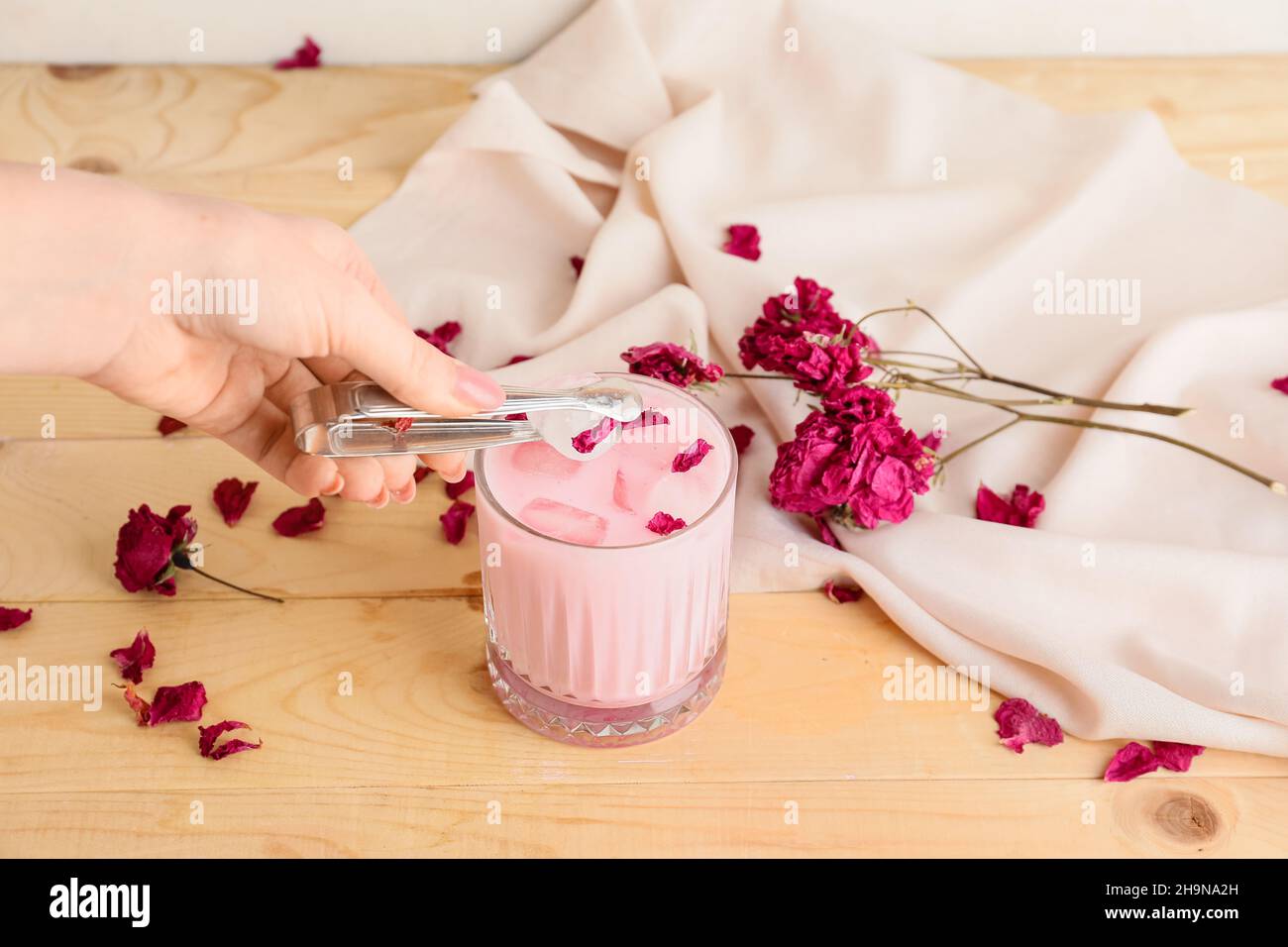 Ice cube in drink adding hi-res stock photography and images - Alamy