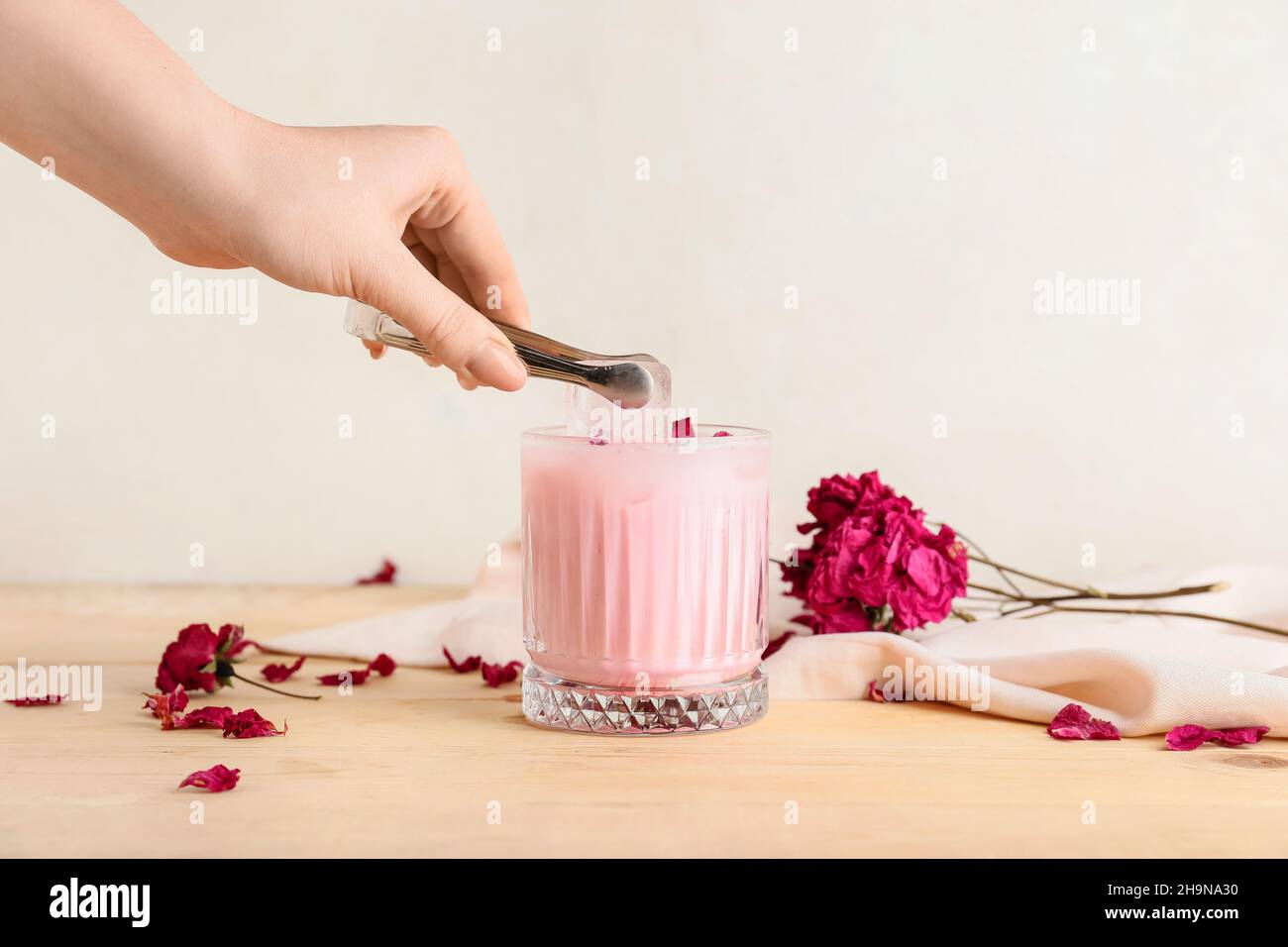 Ice cube in drink adding hi-res stock photography and images - Alamy