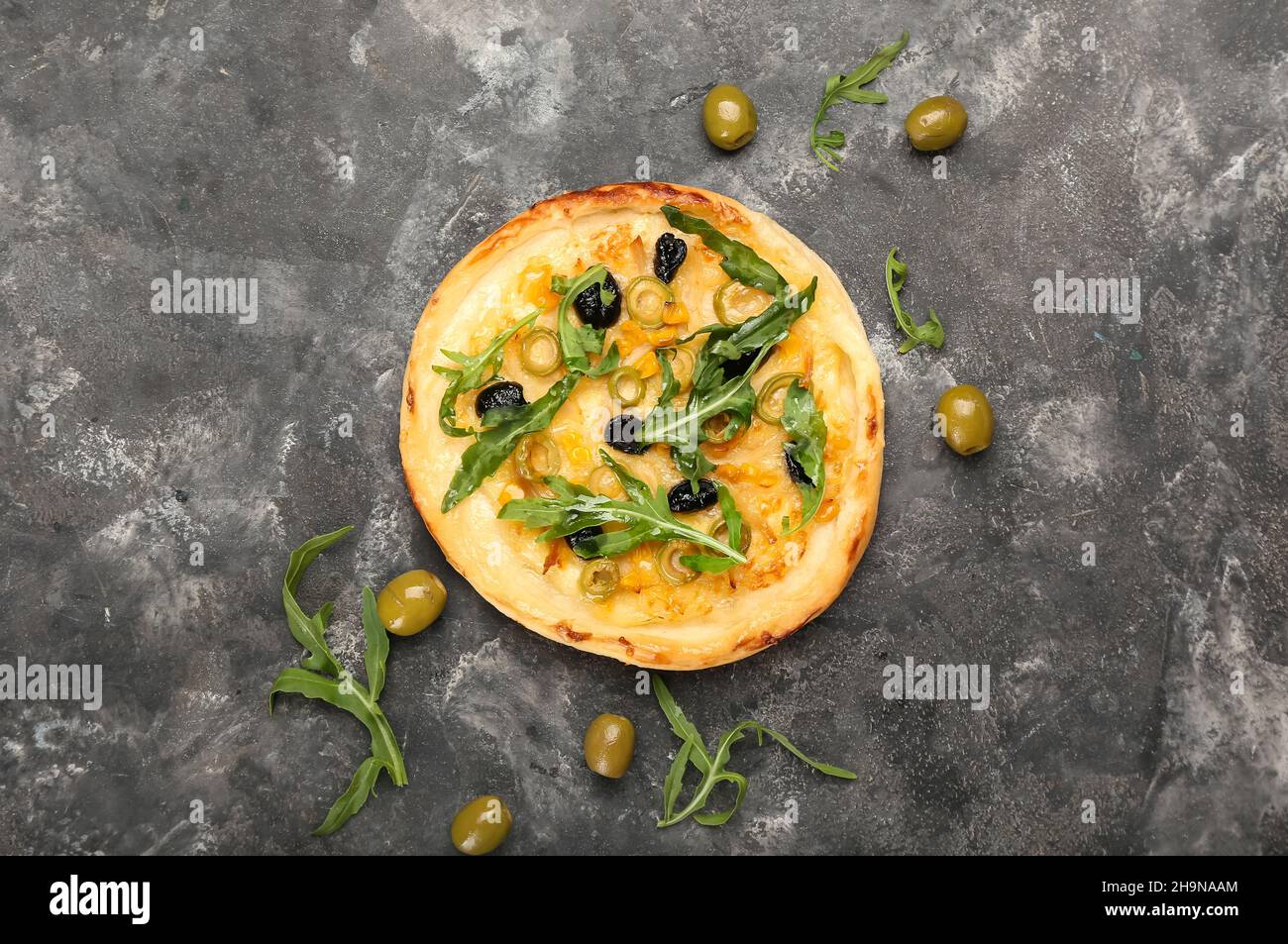 Delicious mini pizza on grey background Stock Photo - Alamy