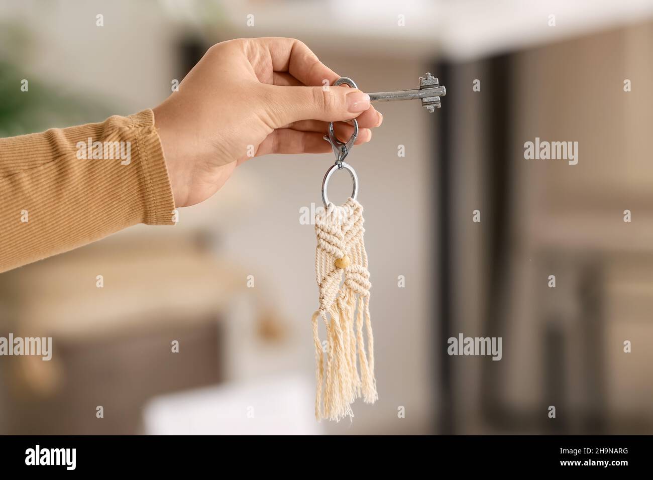 Female key holder hi-res stock photography and images - Alamy